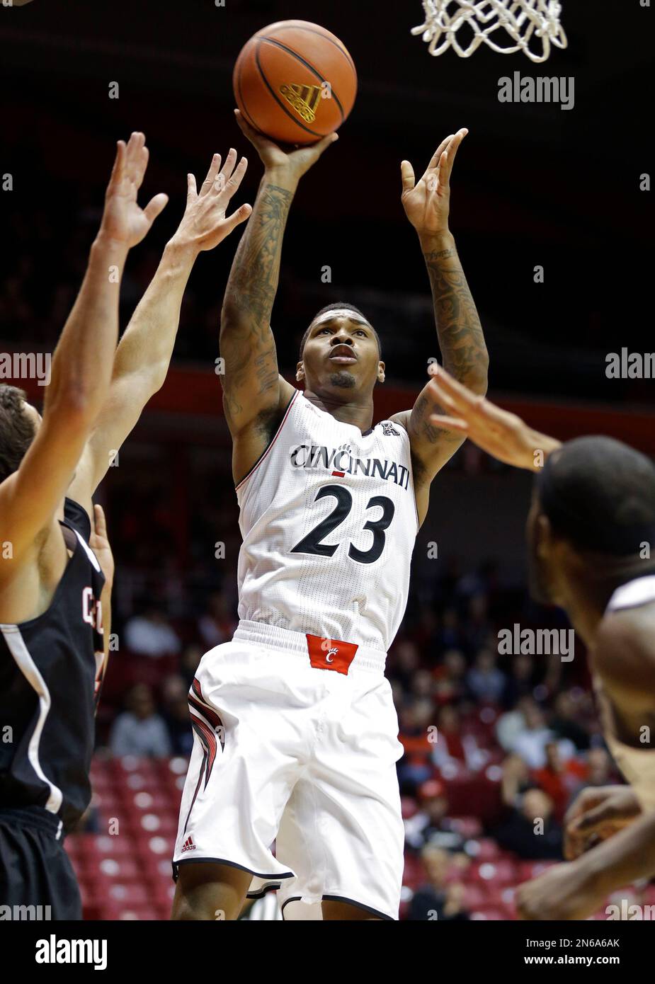 Cincinnati guard Sean Kilpatrick (23) shoots against Carleton in the ...