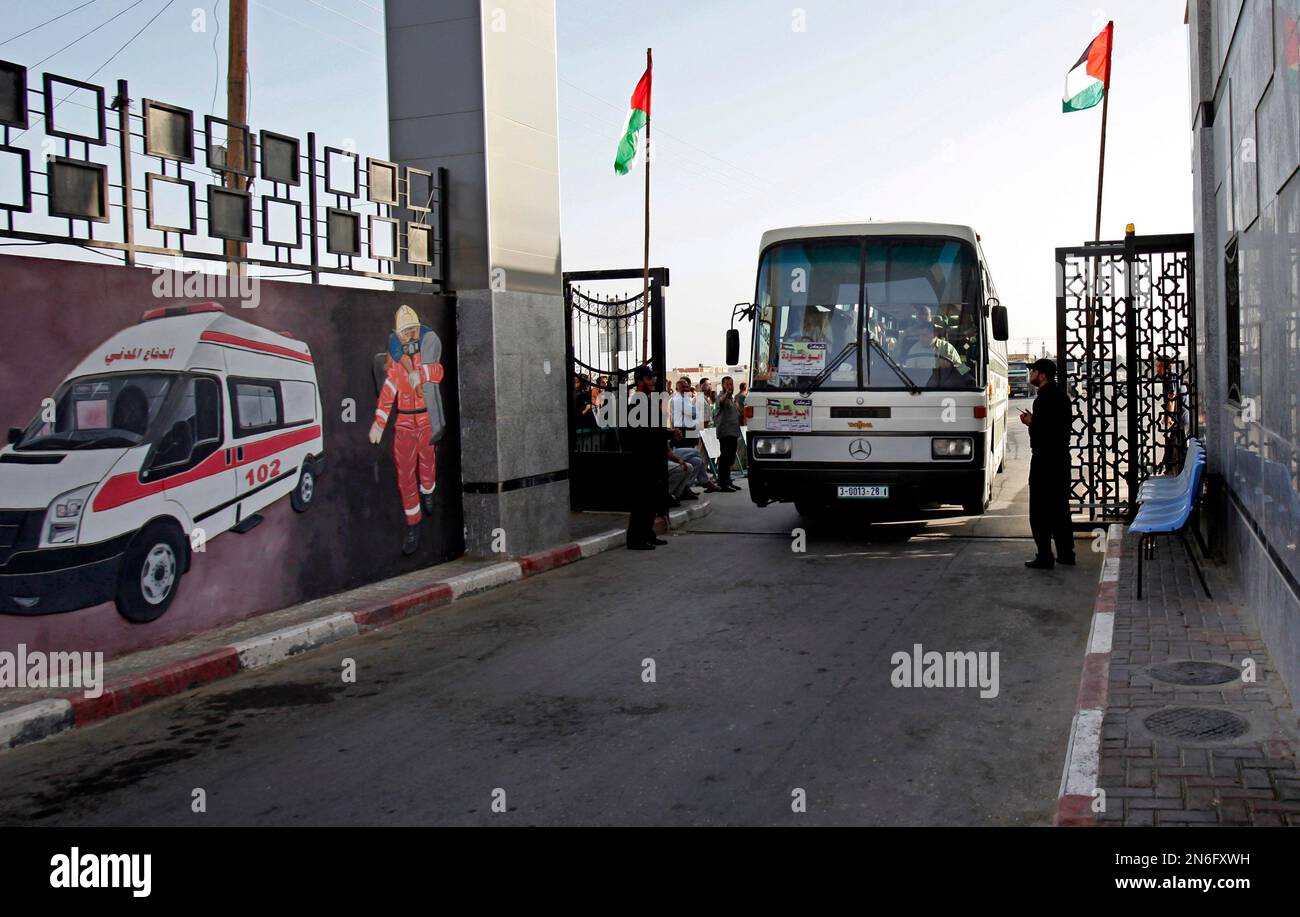 A bus carrying Palestinian Muslim pilgrims leaves en route to Rafah ...