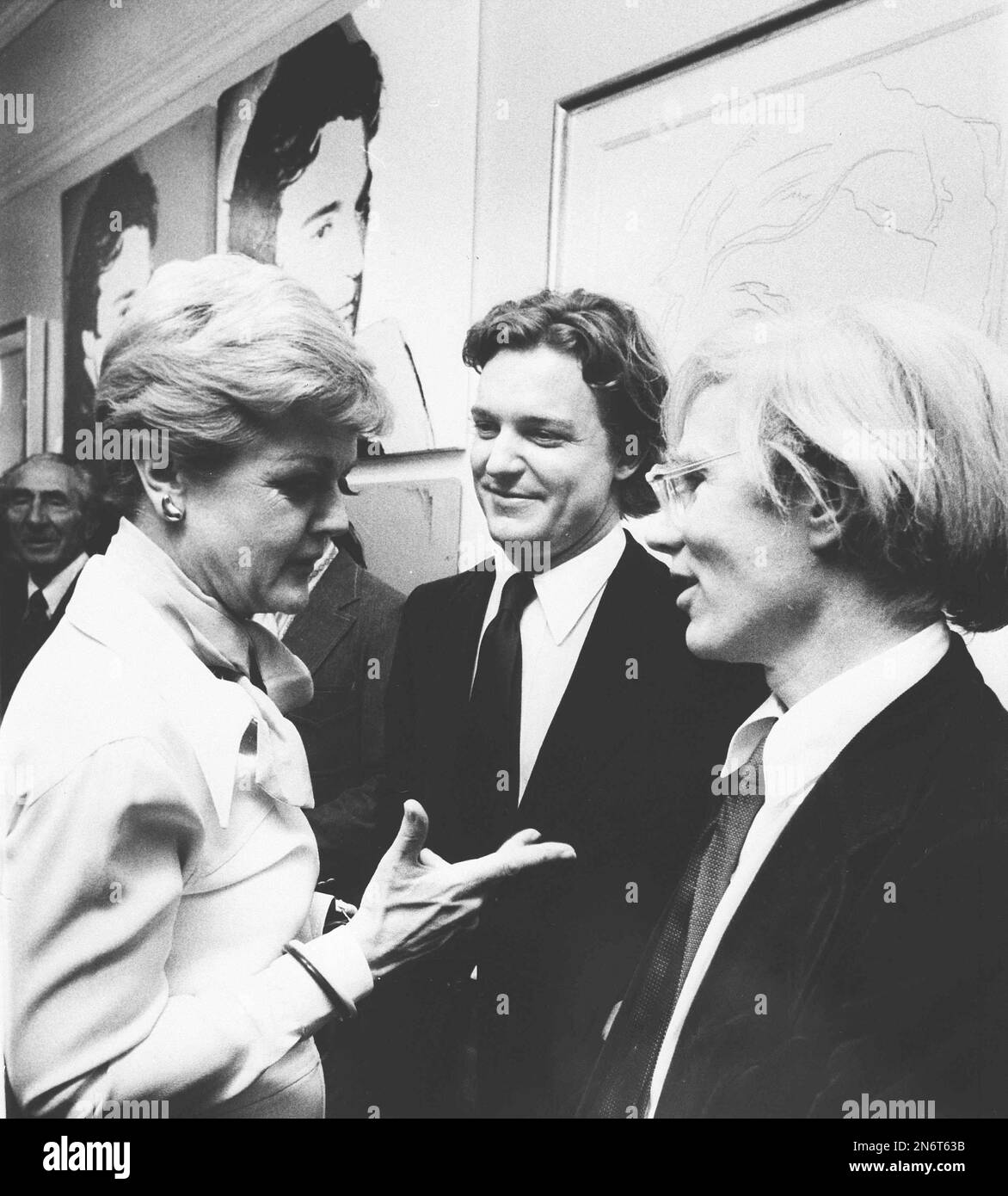 Andy Warhol, right, and Jamie Wyeth, center, talk with Angela Lansbury ...