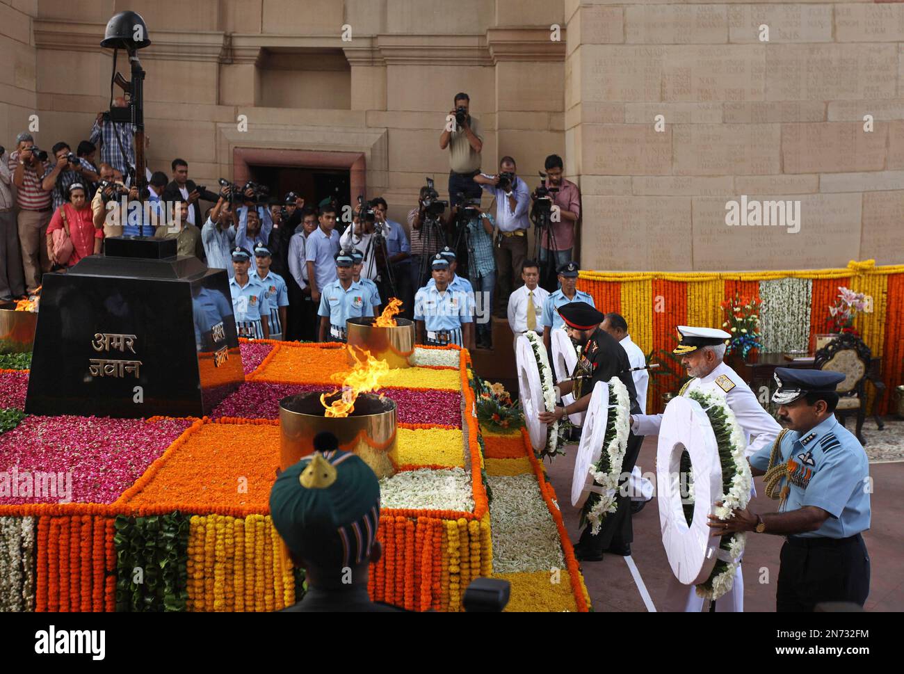 Indian army chief Gen. Bikram Singh, third from right, Indian navy ...