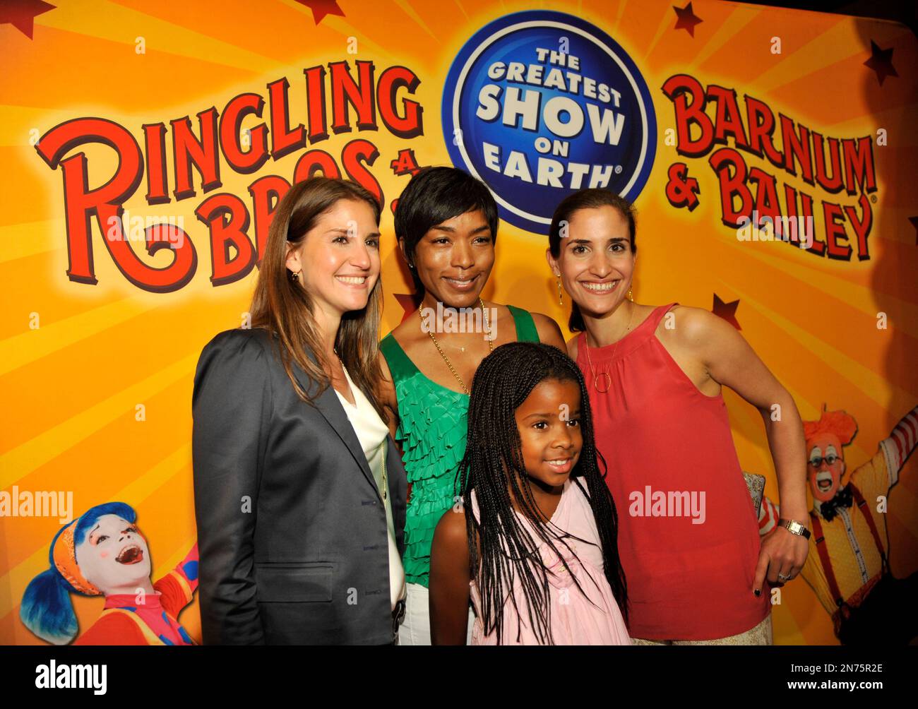 Actress Angela Bassett and her daughter Bronwin pose with Alana Feld ...