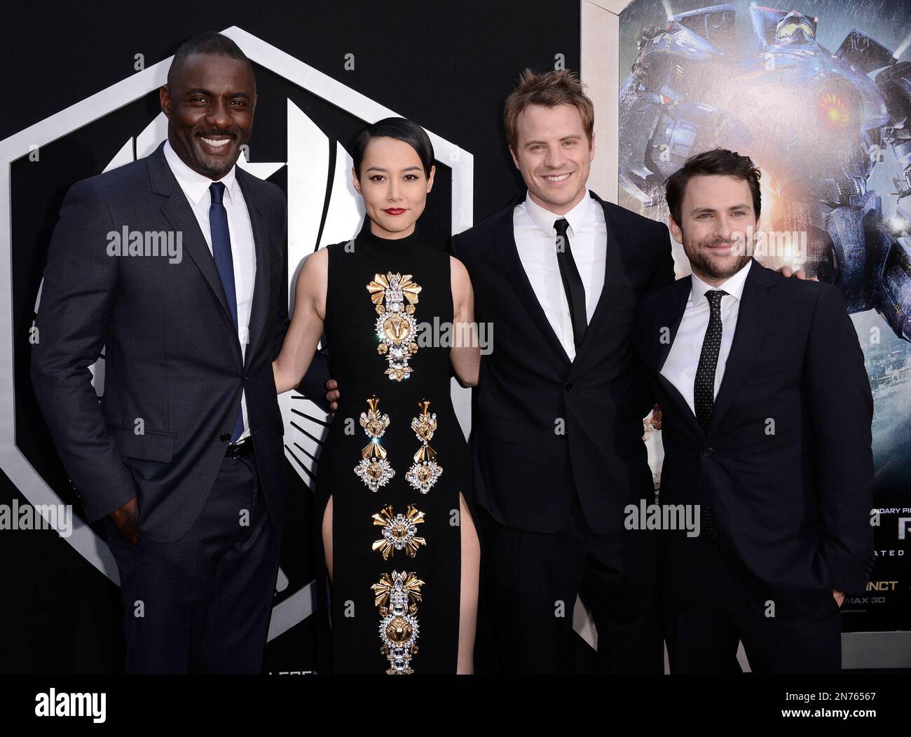 From left to right, actor Idris Elba, actress Rinko Kikuchi, actor ...