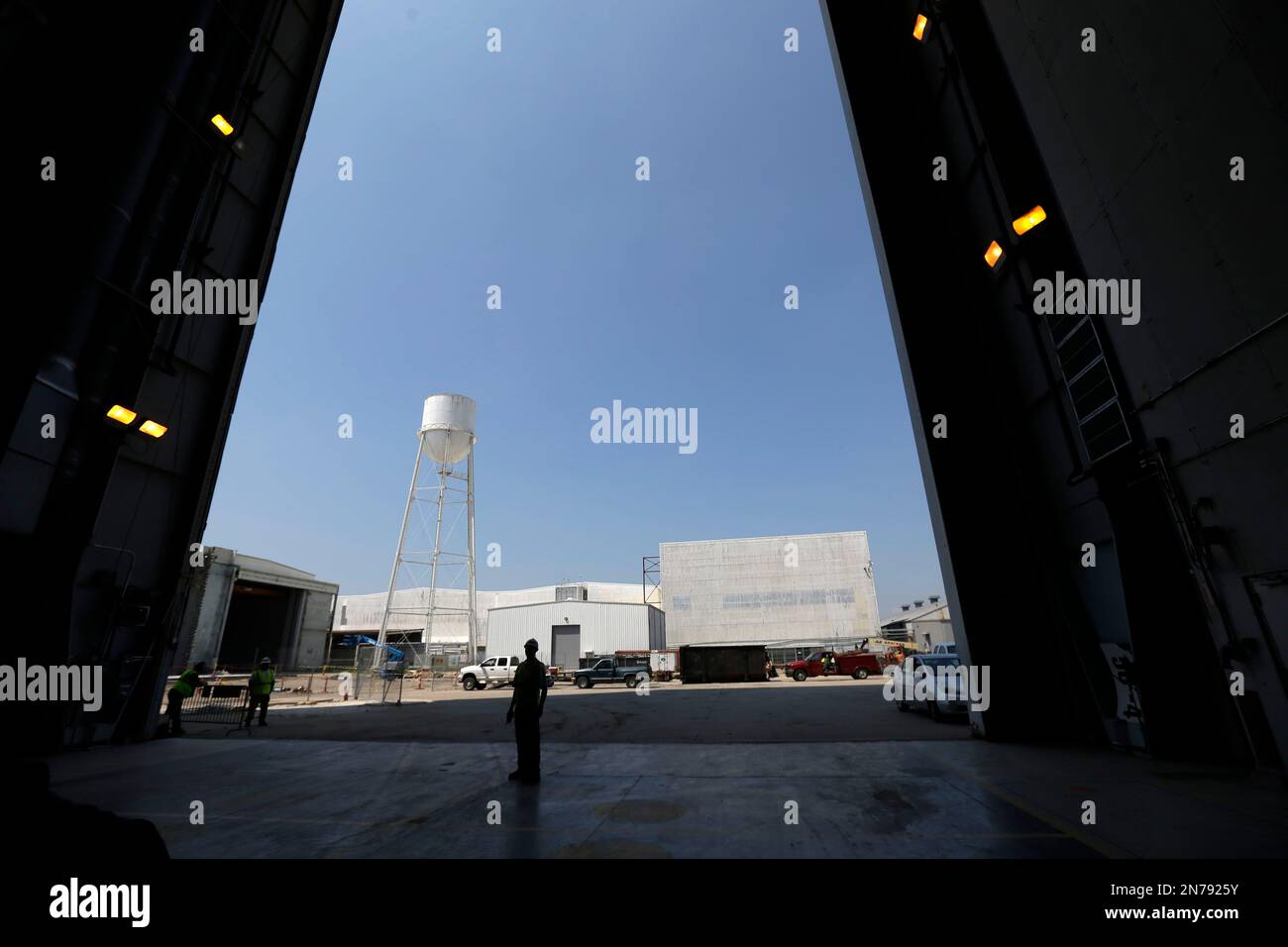 Employees are seen in the vertical assembly building where the world's ...