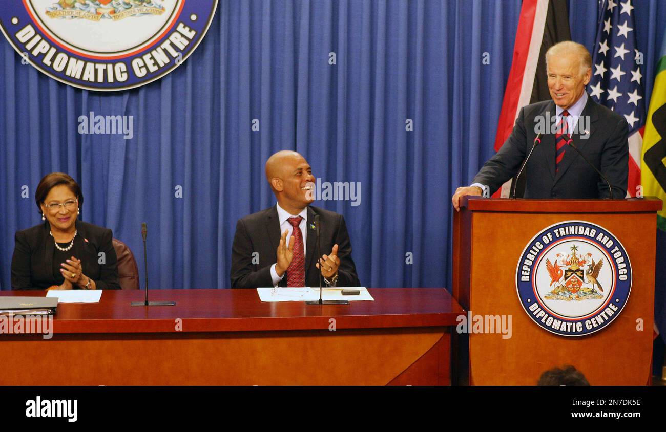 Haiti's President Michel Martelly, center, who's the current Chairman ...