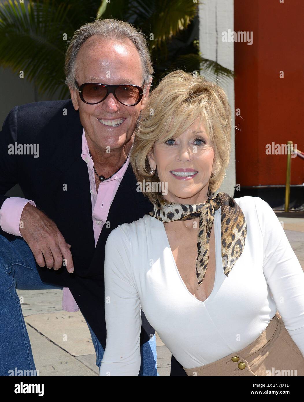 Jane Fonda, right, poses with her brother Peter Fonda in front of their ...