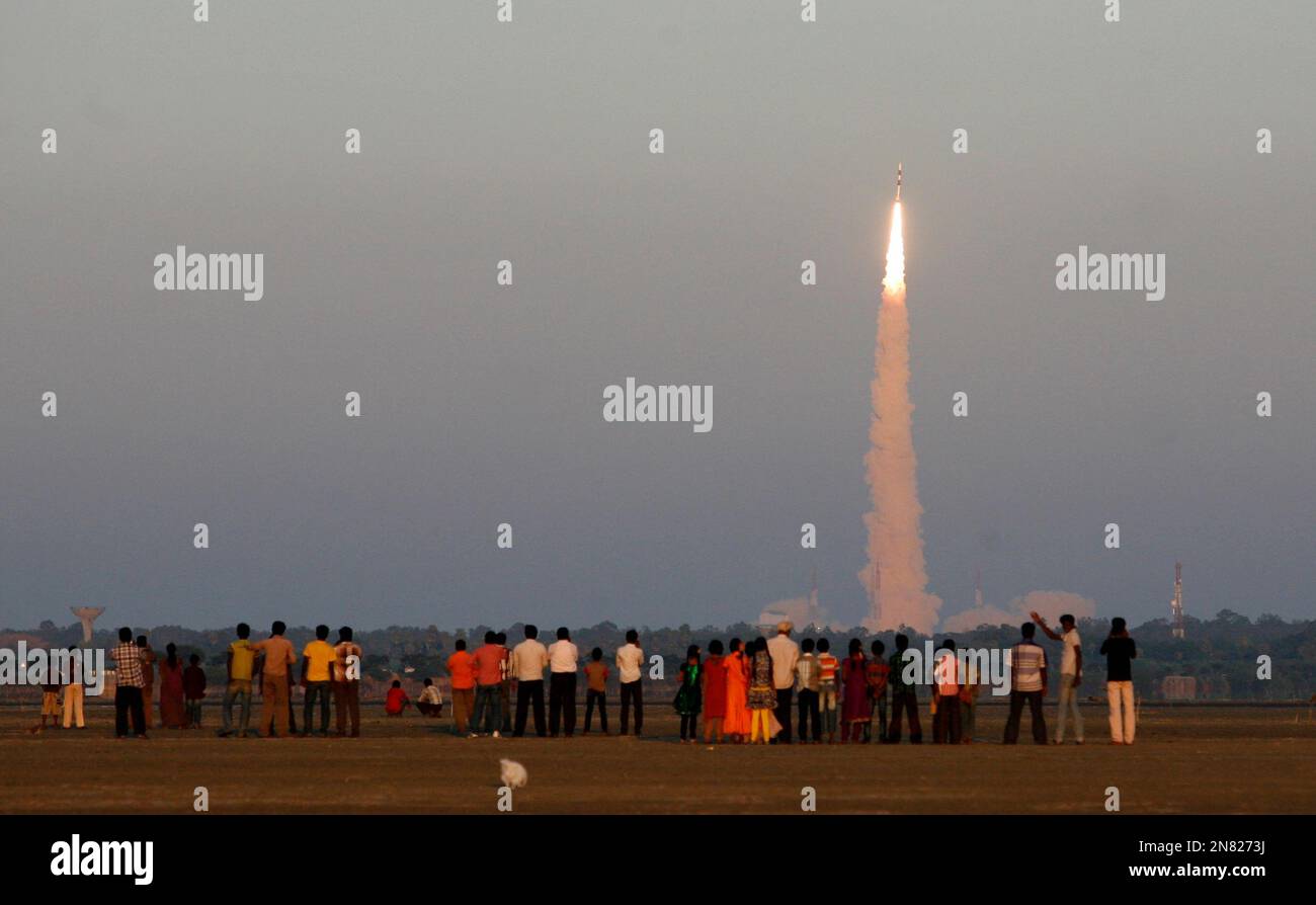 People watch as Indian Space Research Organization’s (ISRO) Polar ...