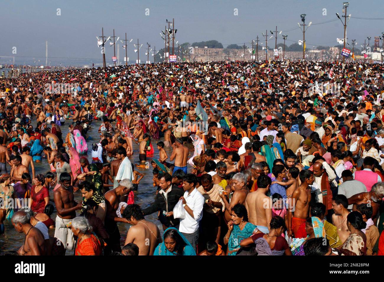 Indian devotees take holy dips at Sangam, the confluence of the Rivers ...