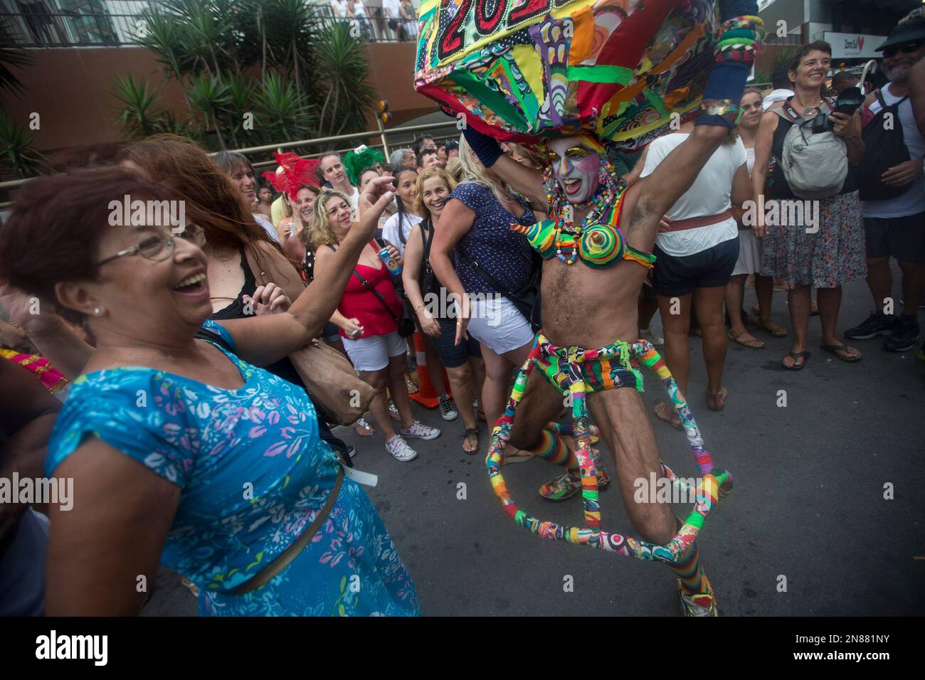 Eduardo Rasberge, 48, known as Suitcase Woman wears a decorative ...