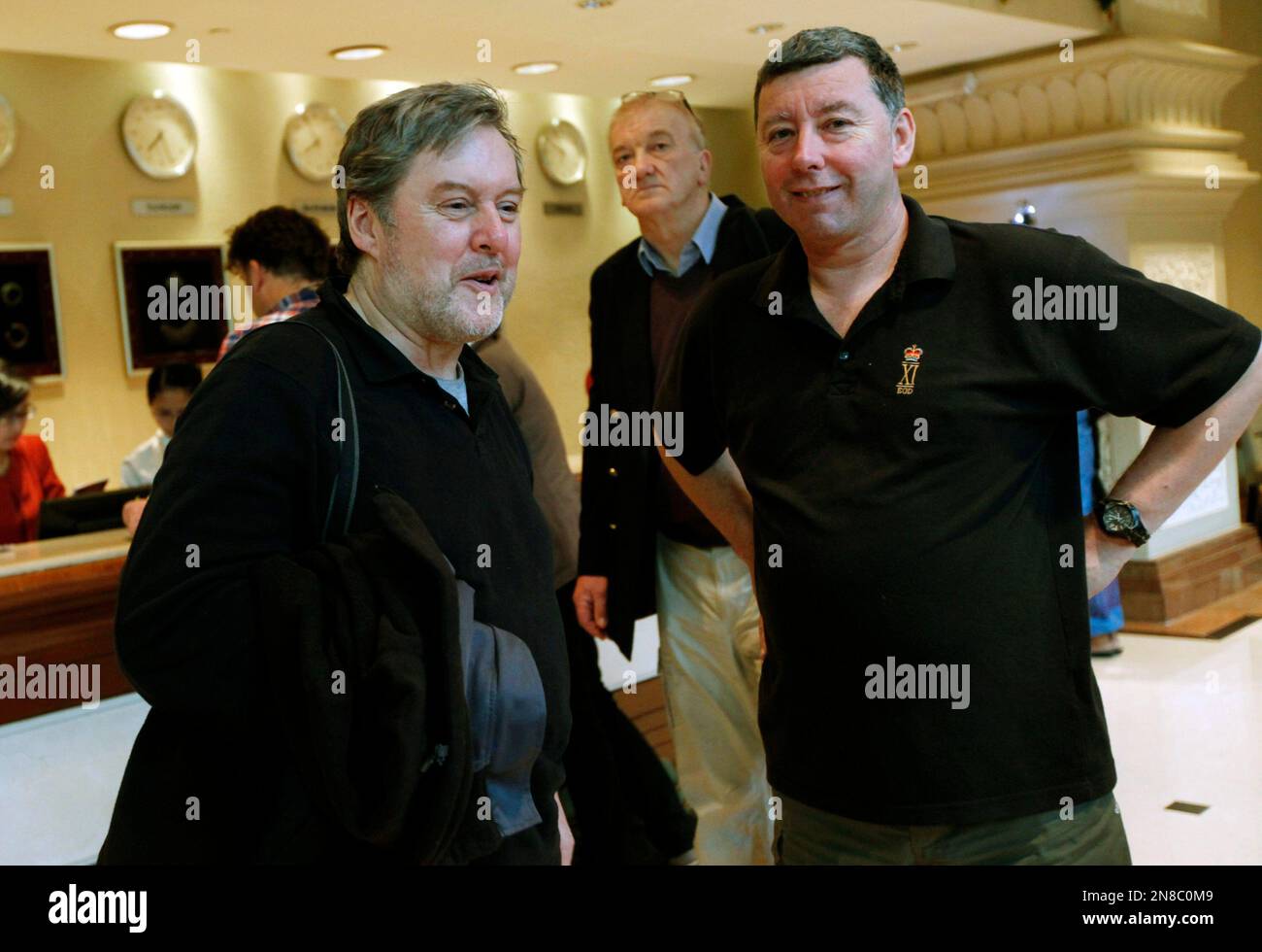 Archaeologists Rod Scott, right, Andy Brockman, left, and farmer and ...