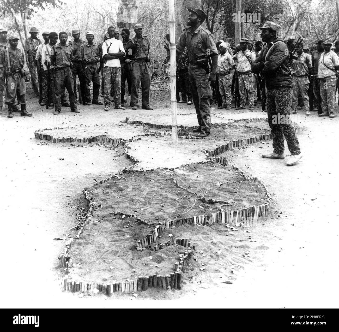FILE: 1974 file photo shows Samora Machel, centre, wearing military ...