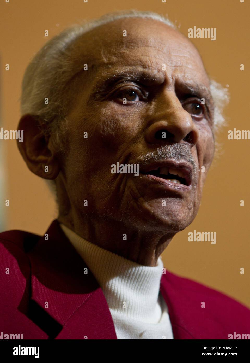FILE -- Tuskegee Airman Lt. Col. Herbert Carter talks with reporters ...