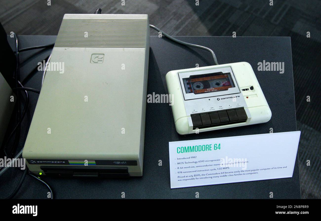 In this photo taken Oct. 30, 2012, a floppy disk drive, left, and a ...