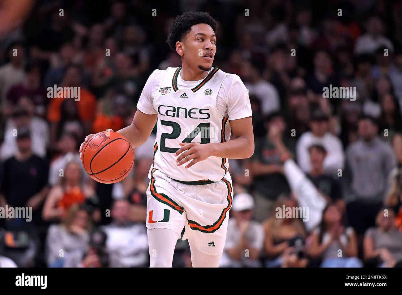CORAL GABLES, FL - FEB 11: Miami guard Nijel Pack (24) handles the ball ...