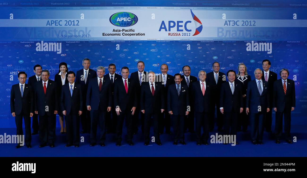Leaders from Pacific-rim nations pose for a group photo on the final ...