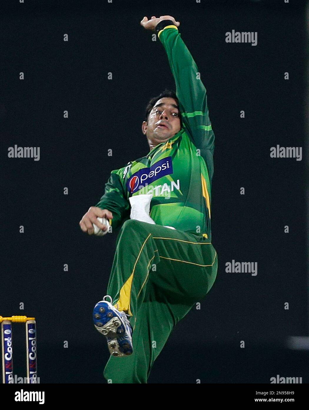 Pakistan's bowler Saeed Ajmal bowls a delivery during the third cricket ...