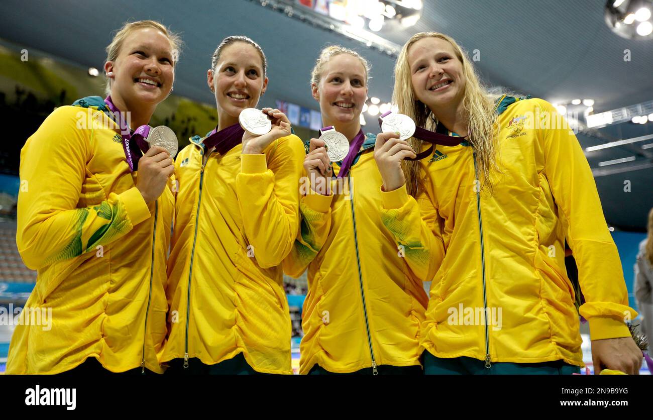 Australia's women's 4 X 200-meter freestyle relay team from left, Kylie Palmer, Alicia Coutts ...