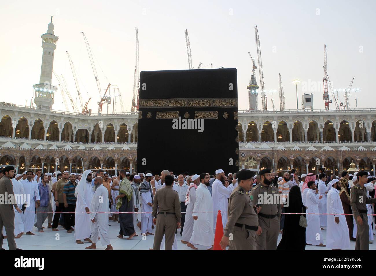 Saudi security forces stand guard during the funeral of the late Saudi ...