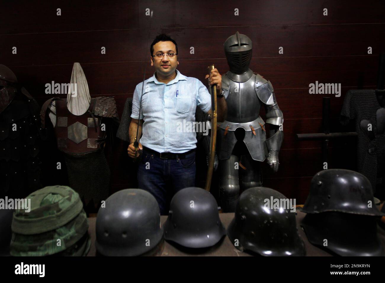 In this, June 2, 2012 photograph, Delhi businessman Ashok Rai, weapons ...
