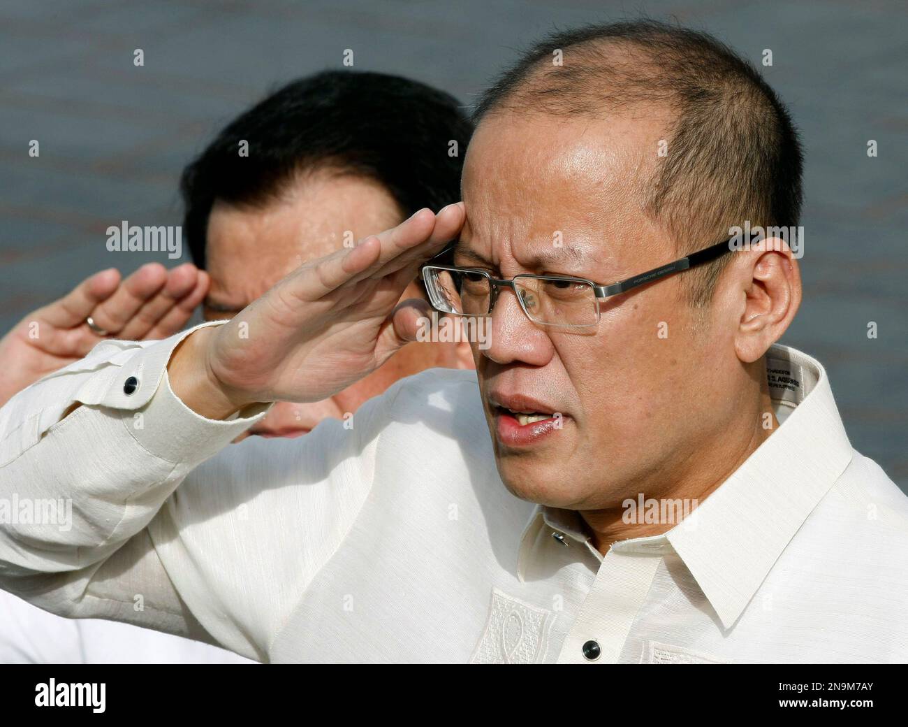 Philippine President Benigno Aquino III salutes the monument of ...
