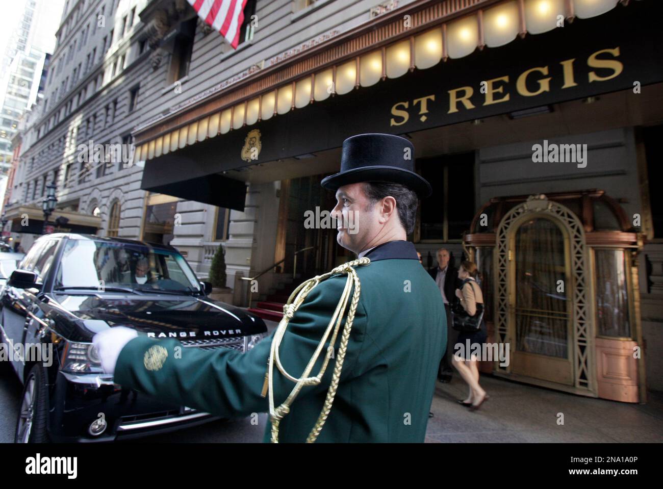 Head doorman Jim Sheehy works outside New York's St. Regis Hotel ...