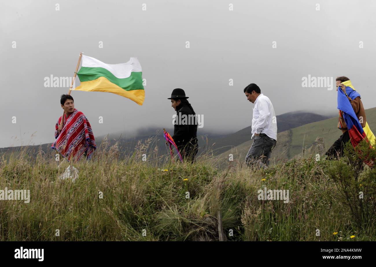 Indigenous protesters walk through the highlands toward Quito to ...