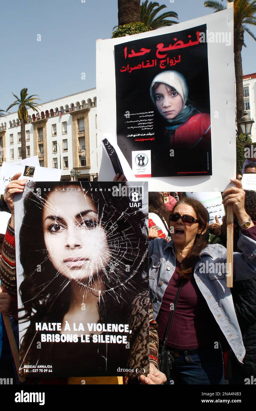Women hold posters of victims as they protest in support of Amina ...