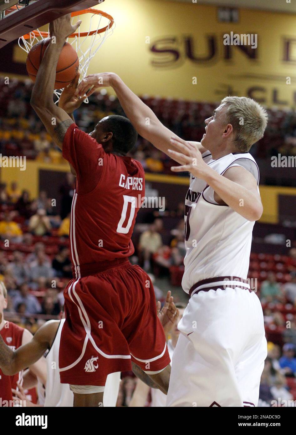 Arizona State forward Jonathan Gilling, right, slaps the ball out of ...