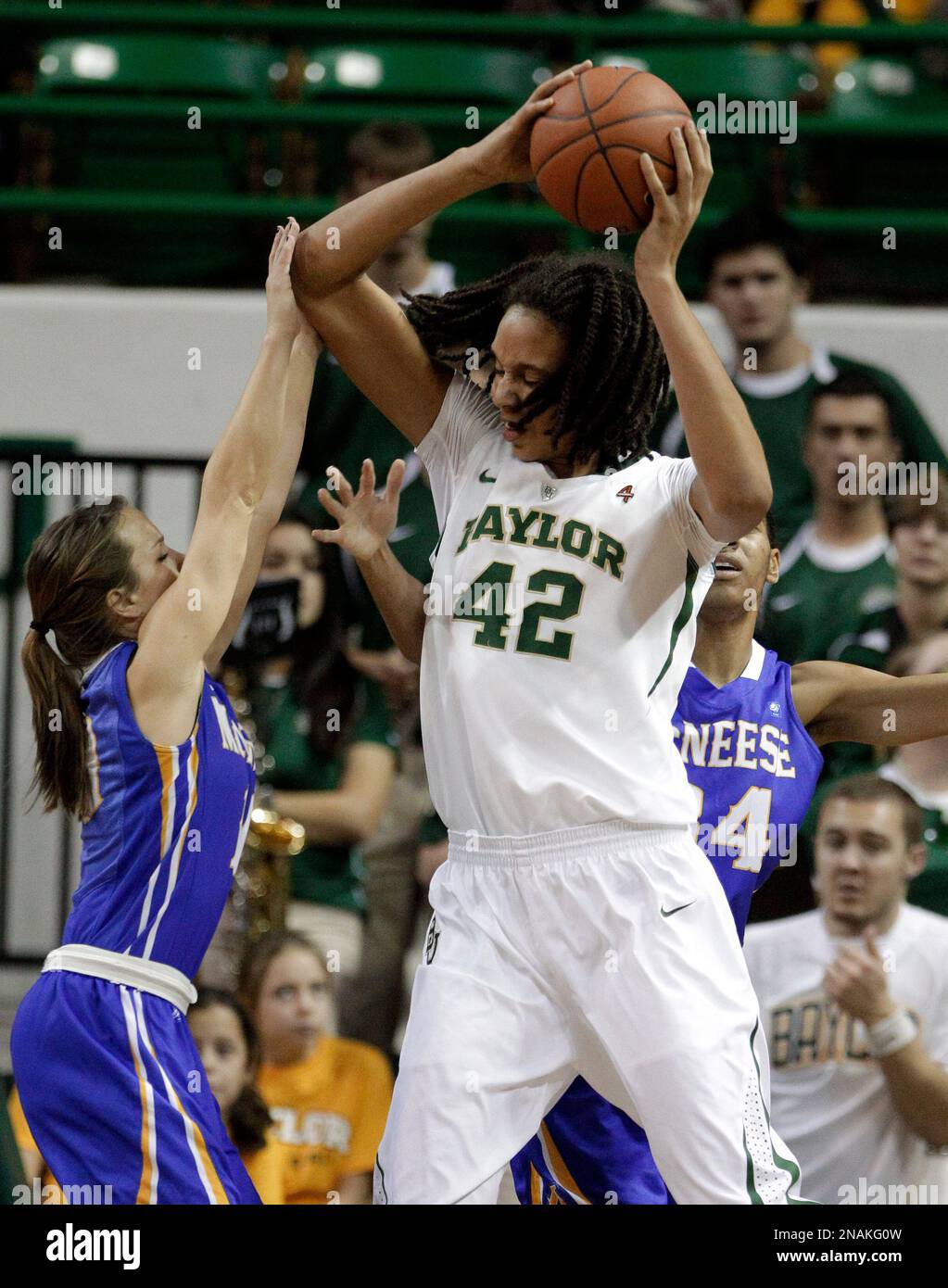 McNeese State guard Caitlyn Baggett, left, and forward Martika Hull ...