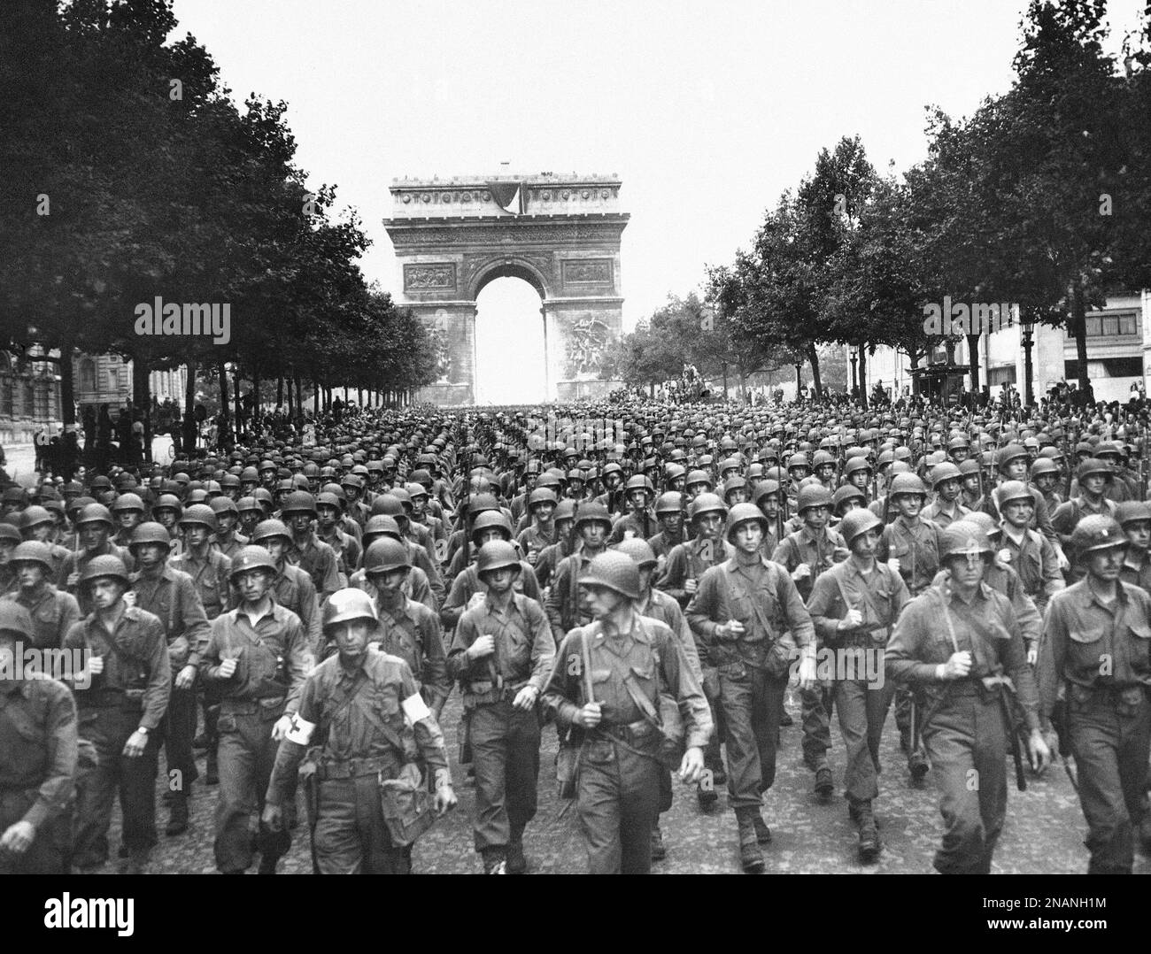 U.S. soldiers of Pennsylvania's 28th Infantry Division march along the ...