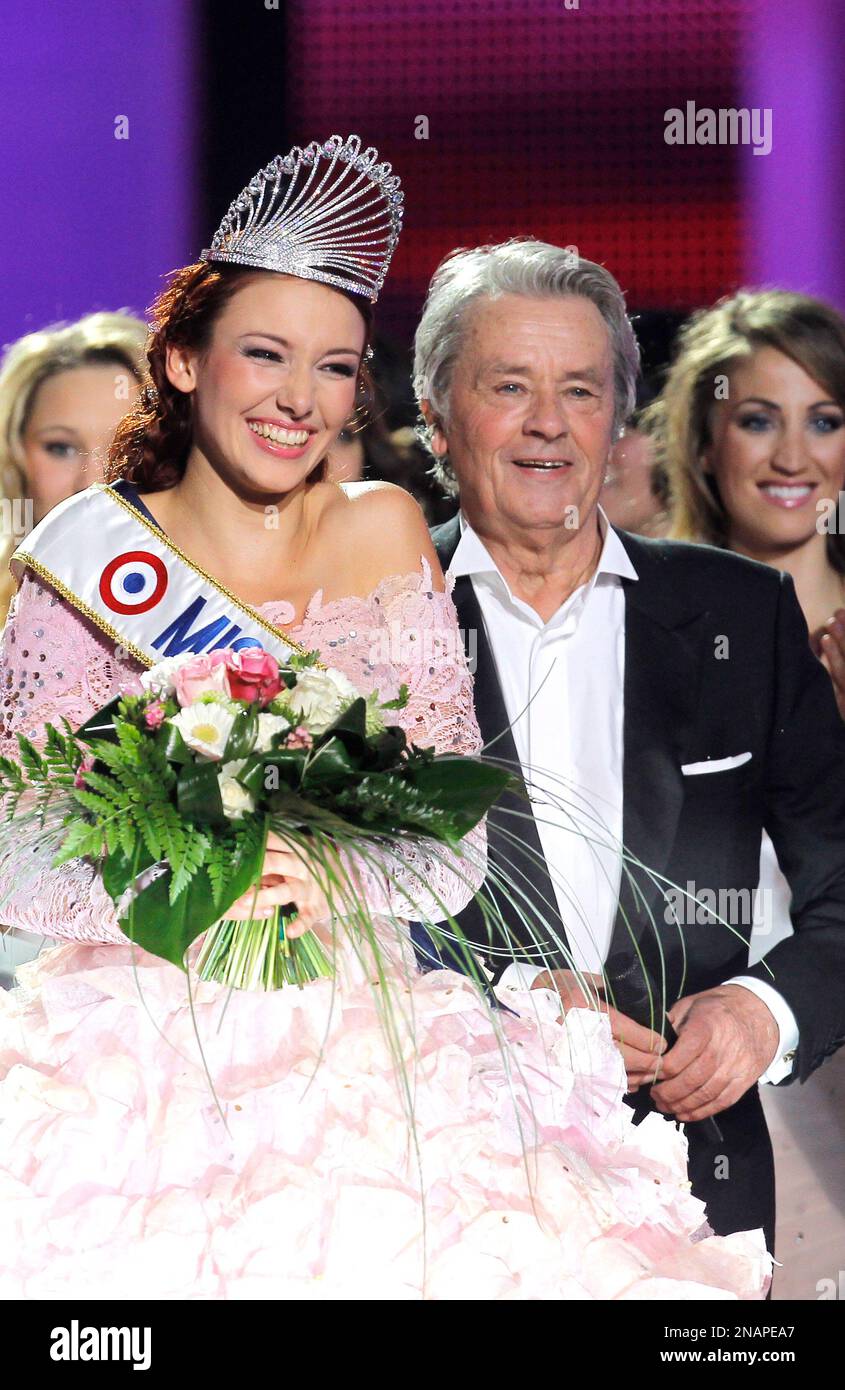The Miss Alsace region Delphine Wespiser, left, smiles as she stands ...