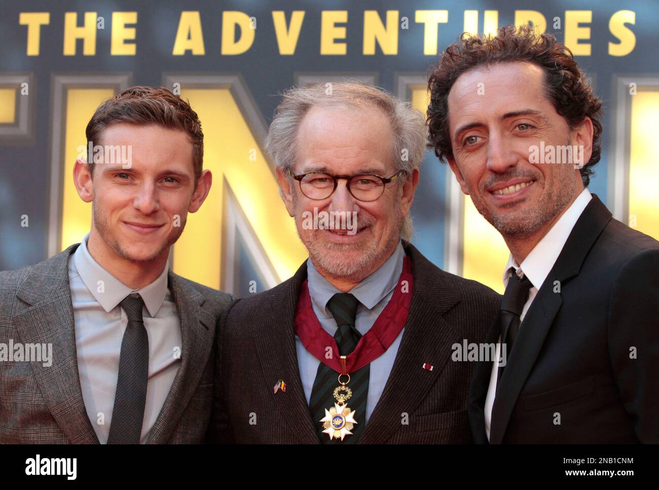 Movie director Steven Spielberg, center, British actor Jamie Bell, left ...