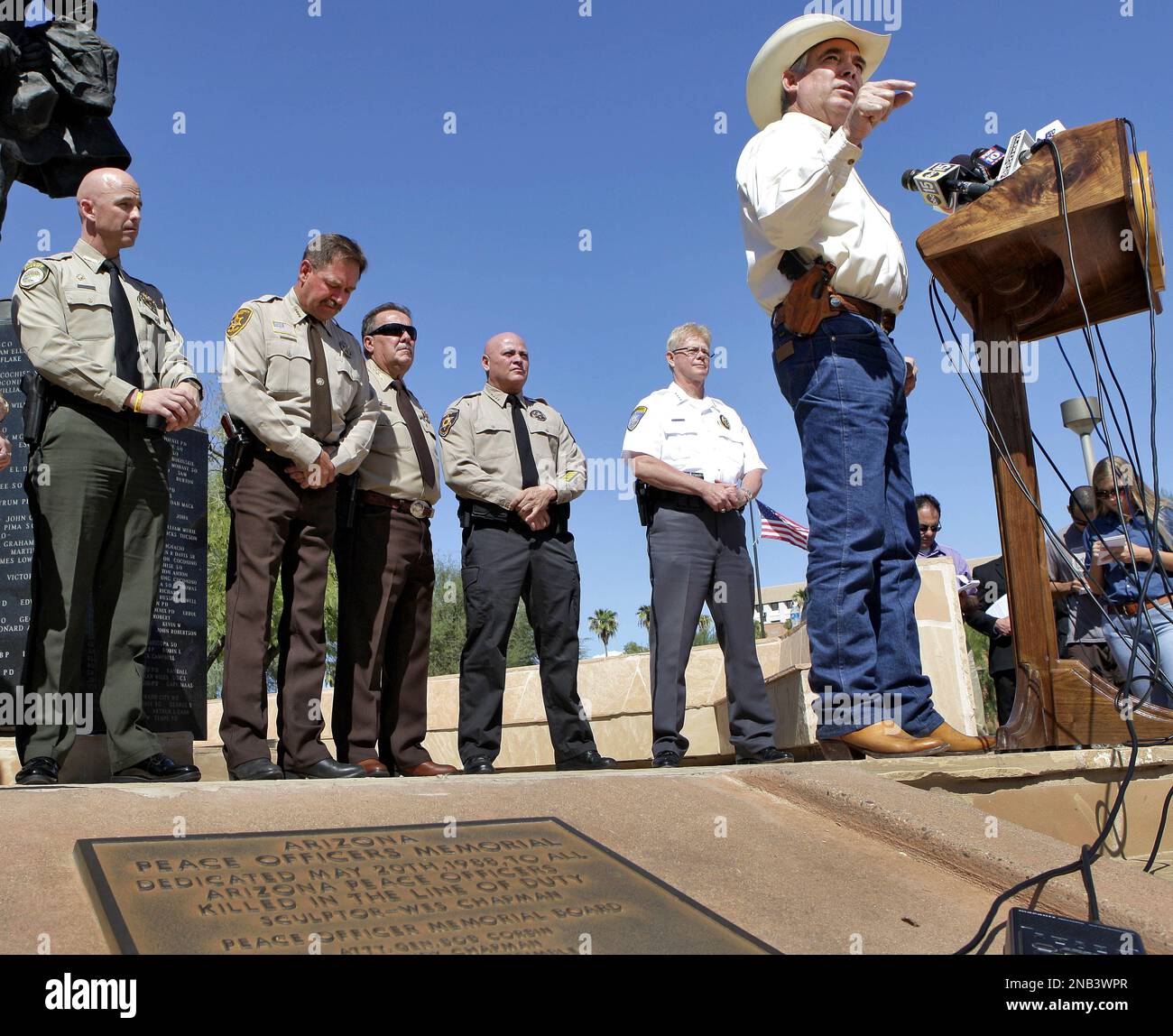 Cochise County Sheriff Larry Dever speaks as, from left, Pinal County ...