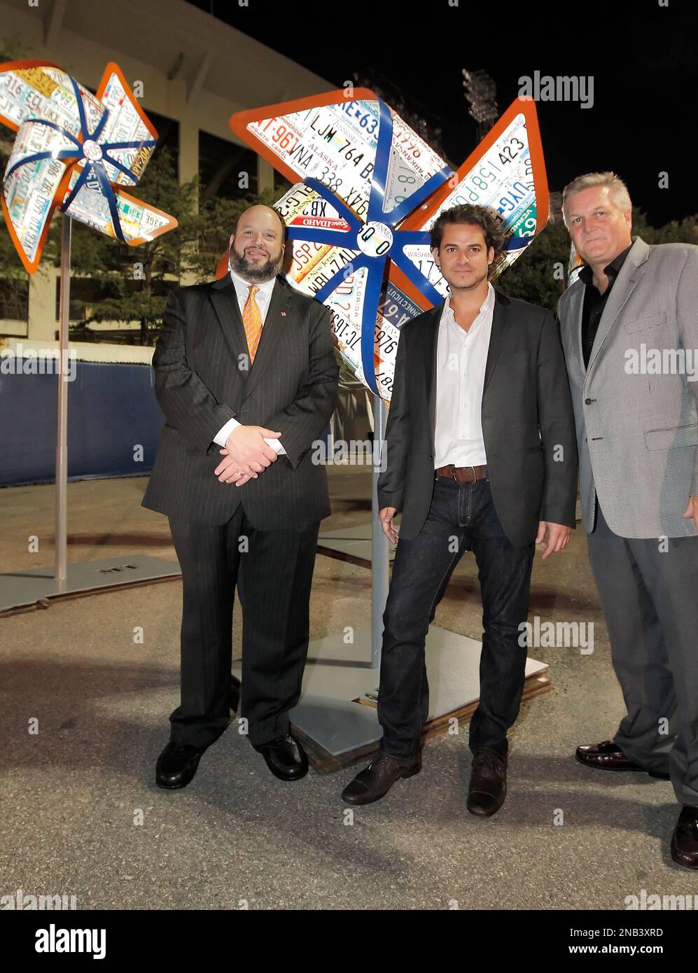 Tom Croce, left, artist Michael Kalish, center, and Tom Kallstrom ...