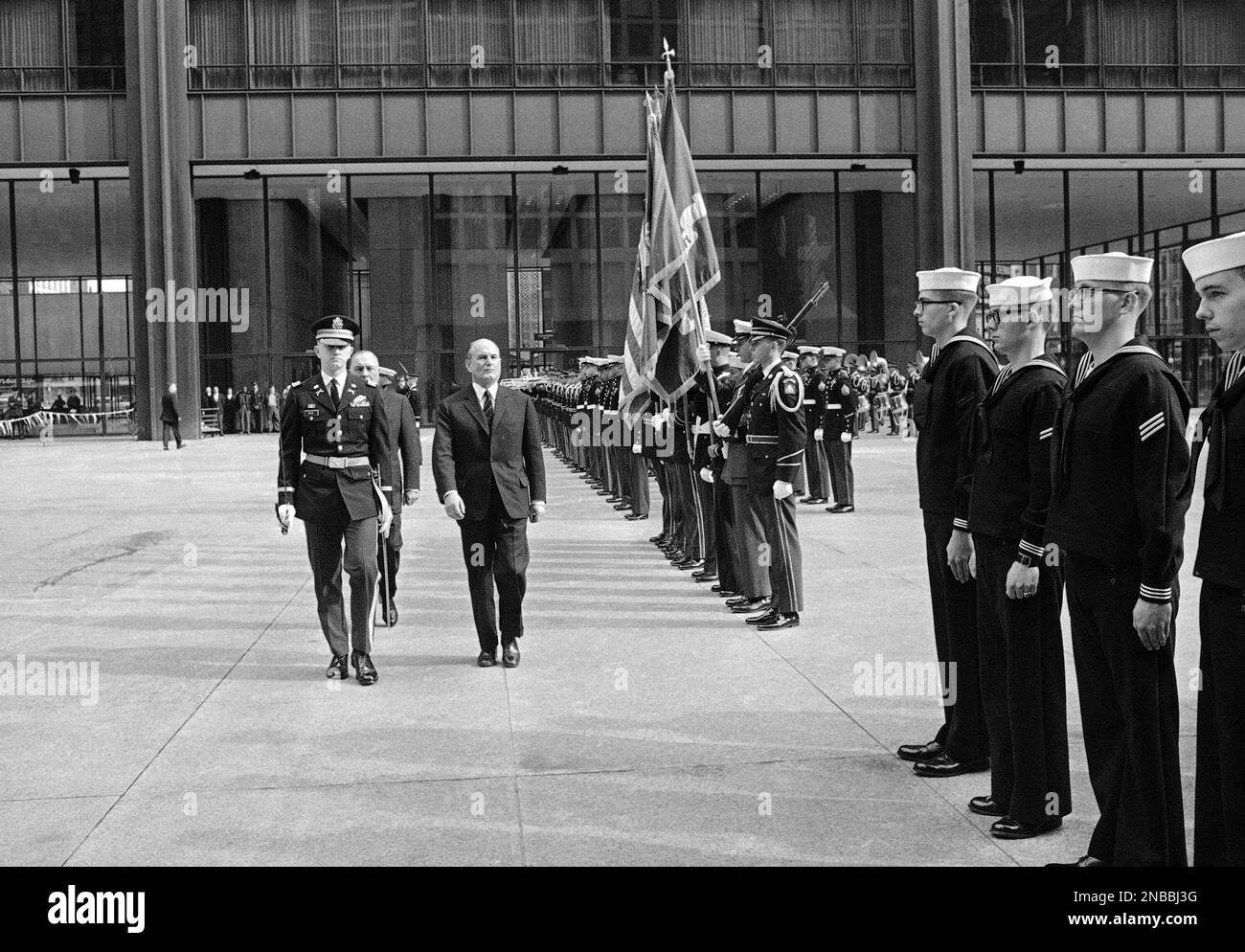 Dr. Josef Klaus, Federal Chancellor of Austria, reviews the honor guard ...