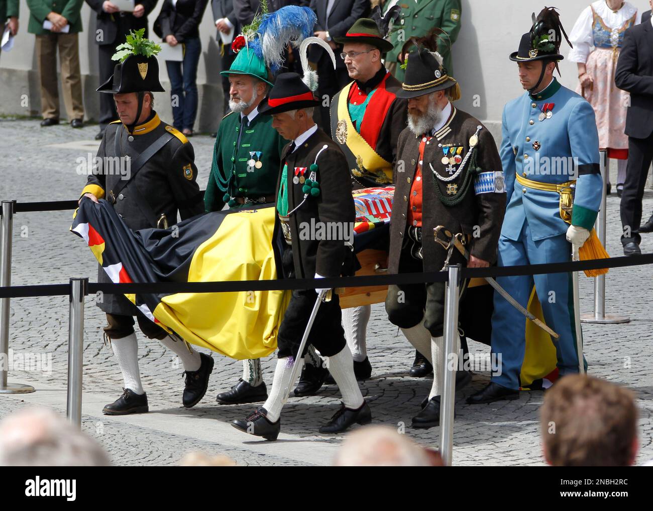 People in traditional clothes carry the coffin of Archduke Otto von ...