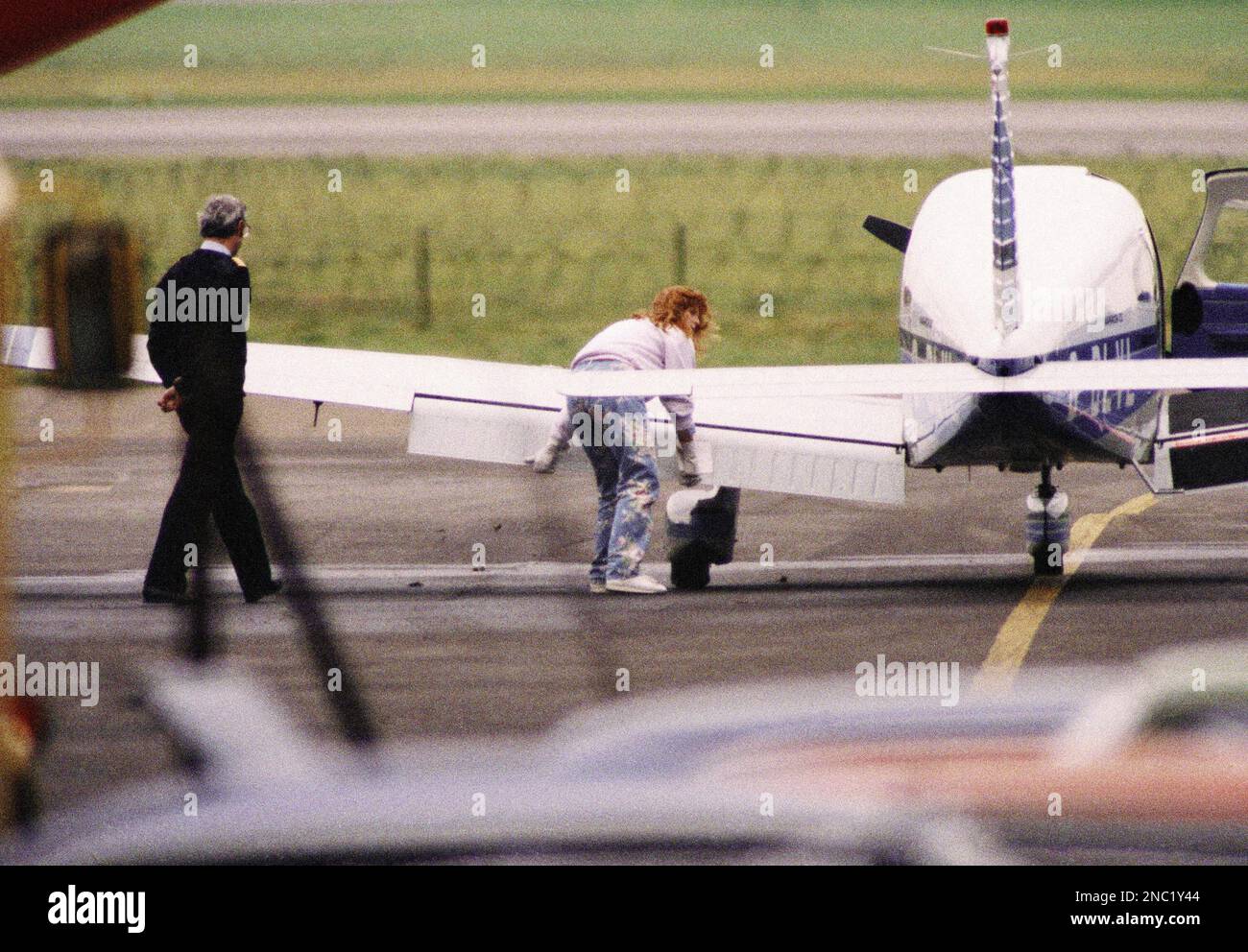 Sarah Ferguson, the Duchess of York, makes preflight checks before ...
