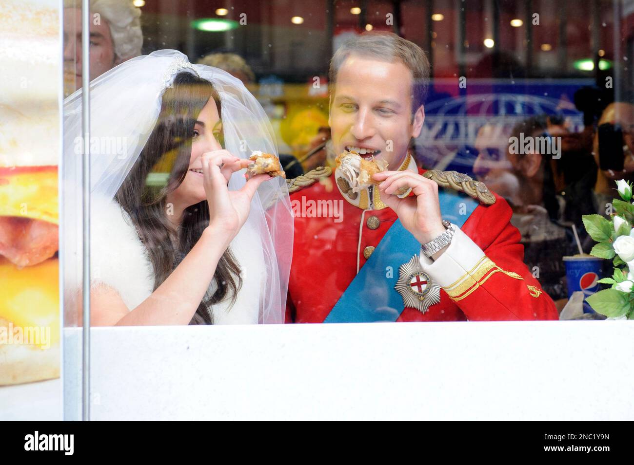 Impersonators Simon Watkinson as Prince William, left, and Jodie Bredo ...