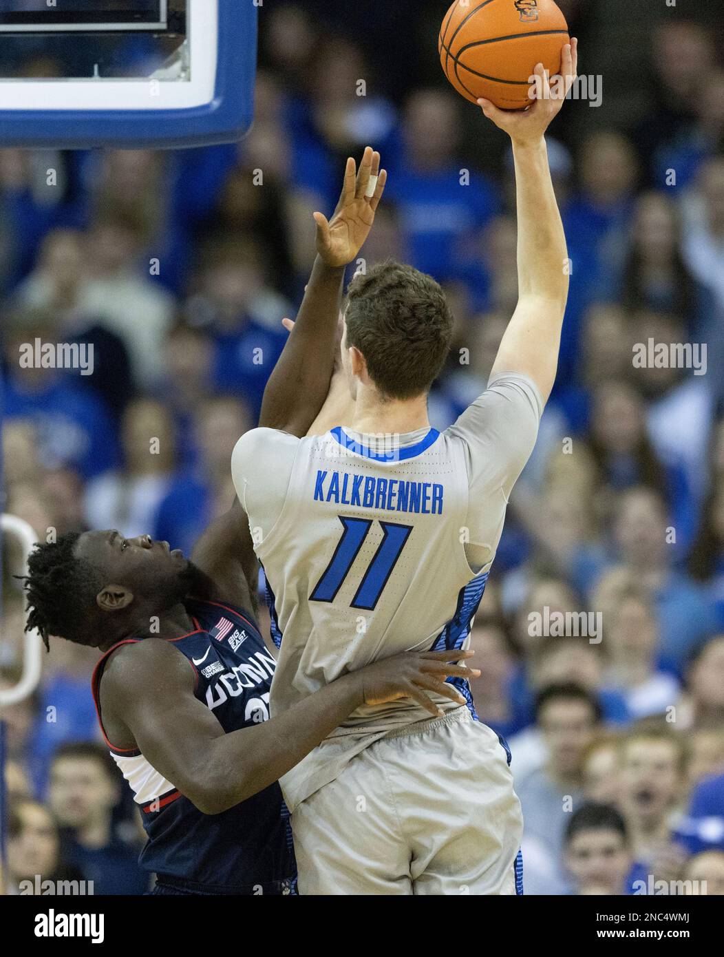 UConn's Adama Sanogo, left, reaches to block a shot from Creighton's ...