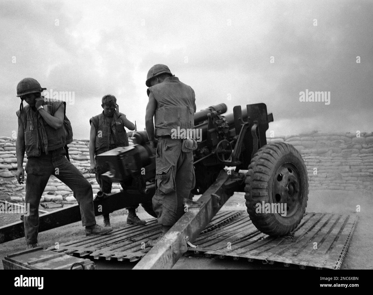 A U.S. Marine artillery crew stationed two miles south of the eastern ...