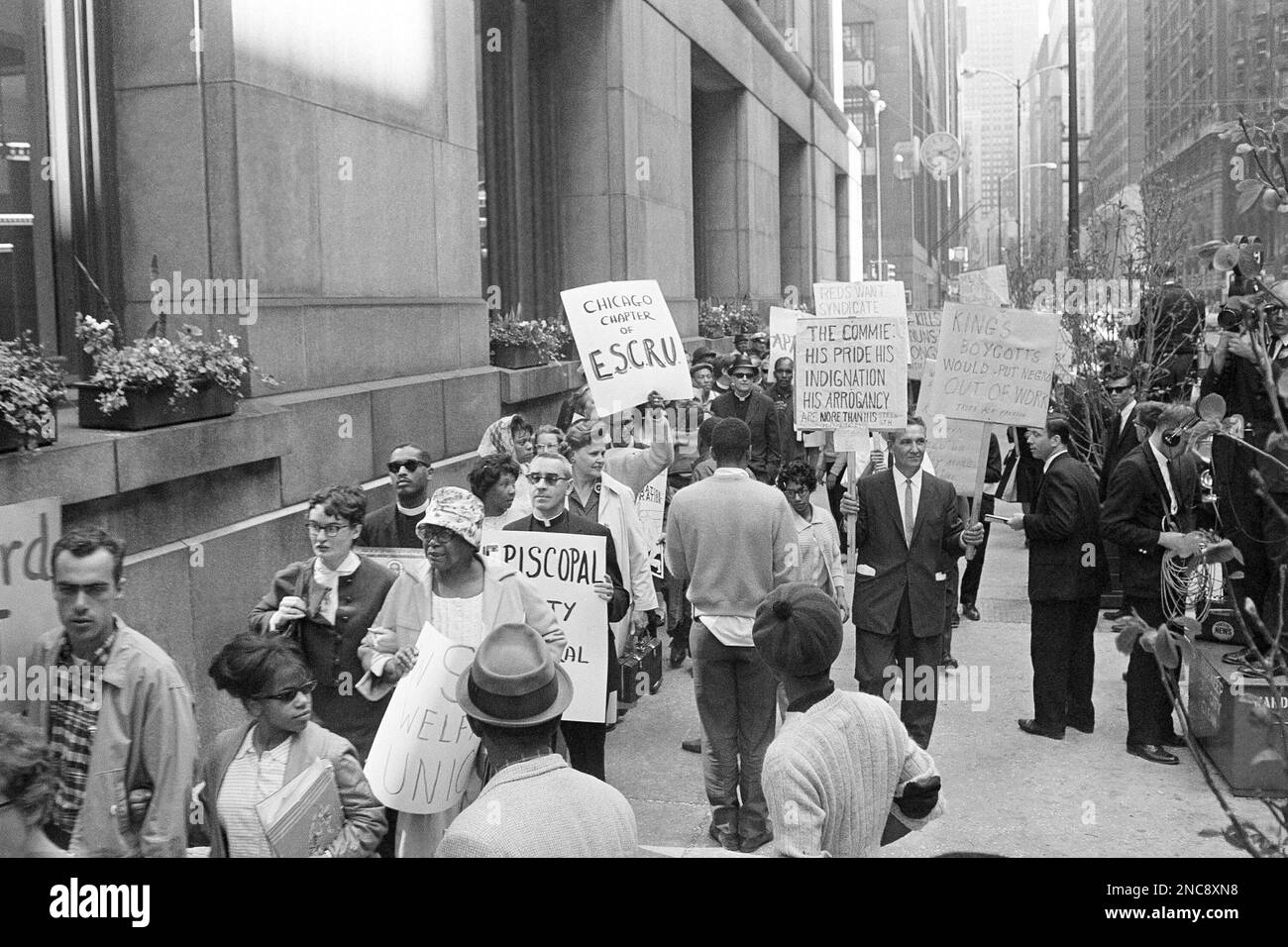 Group of civil rights marchers, left, picket Chicago’s City Hall, June ...