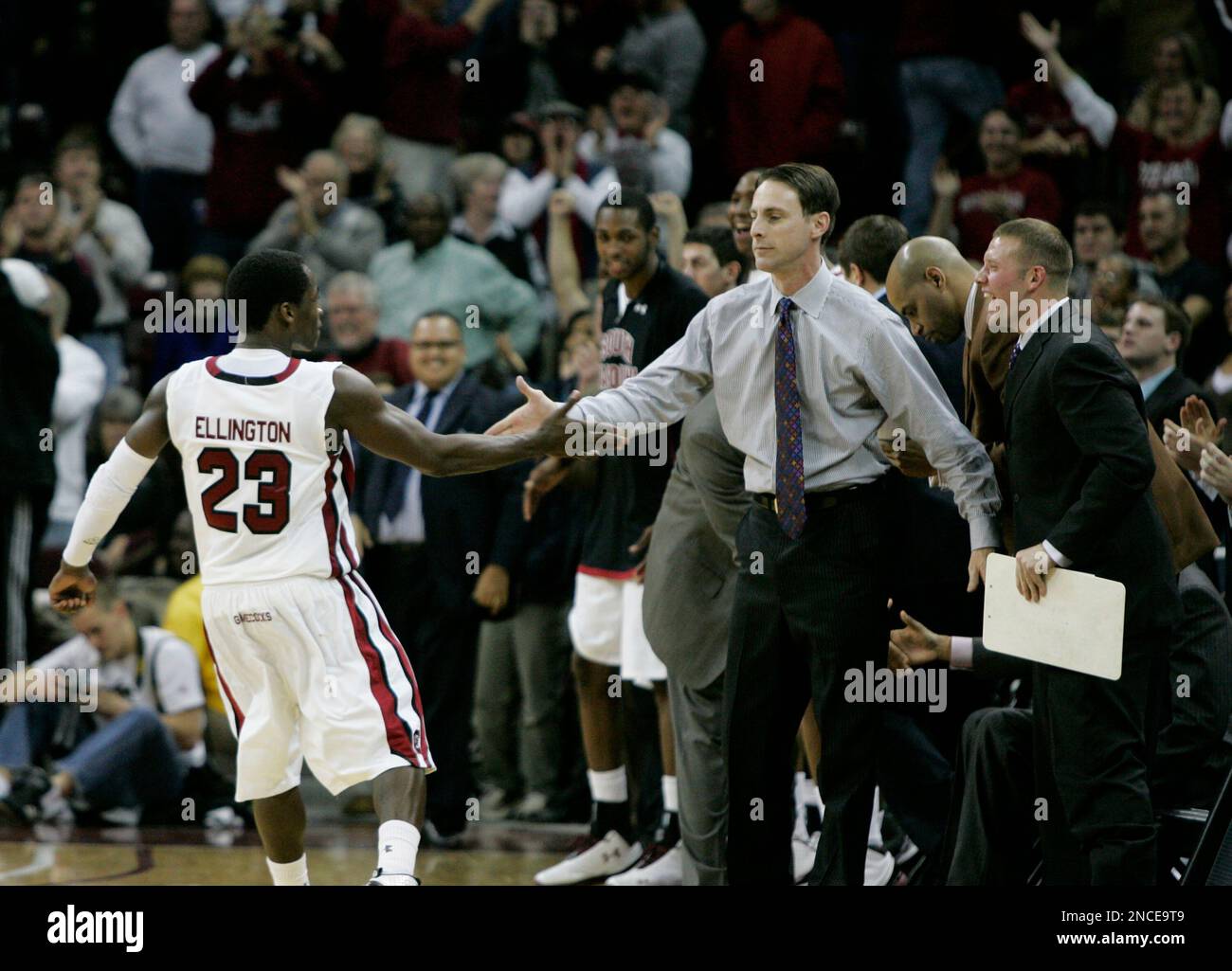 South Carolina's Bruce Ellington slaps hands with coach Darrin Horn as ...