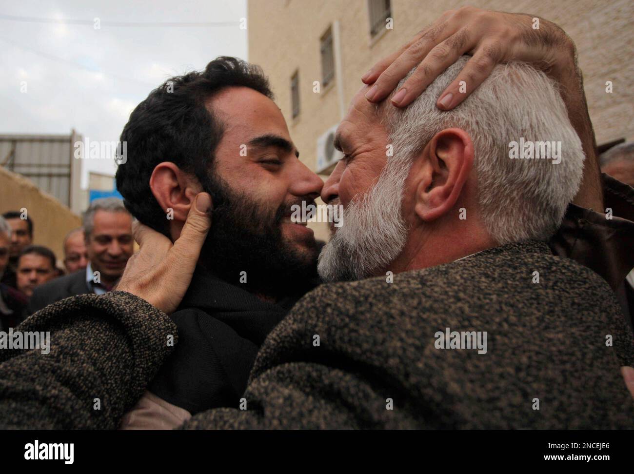 Hamas lawmaker Jamal Natish, right, greets released Palestinian ...
