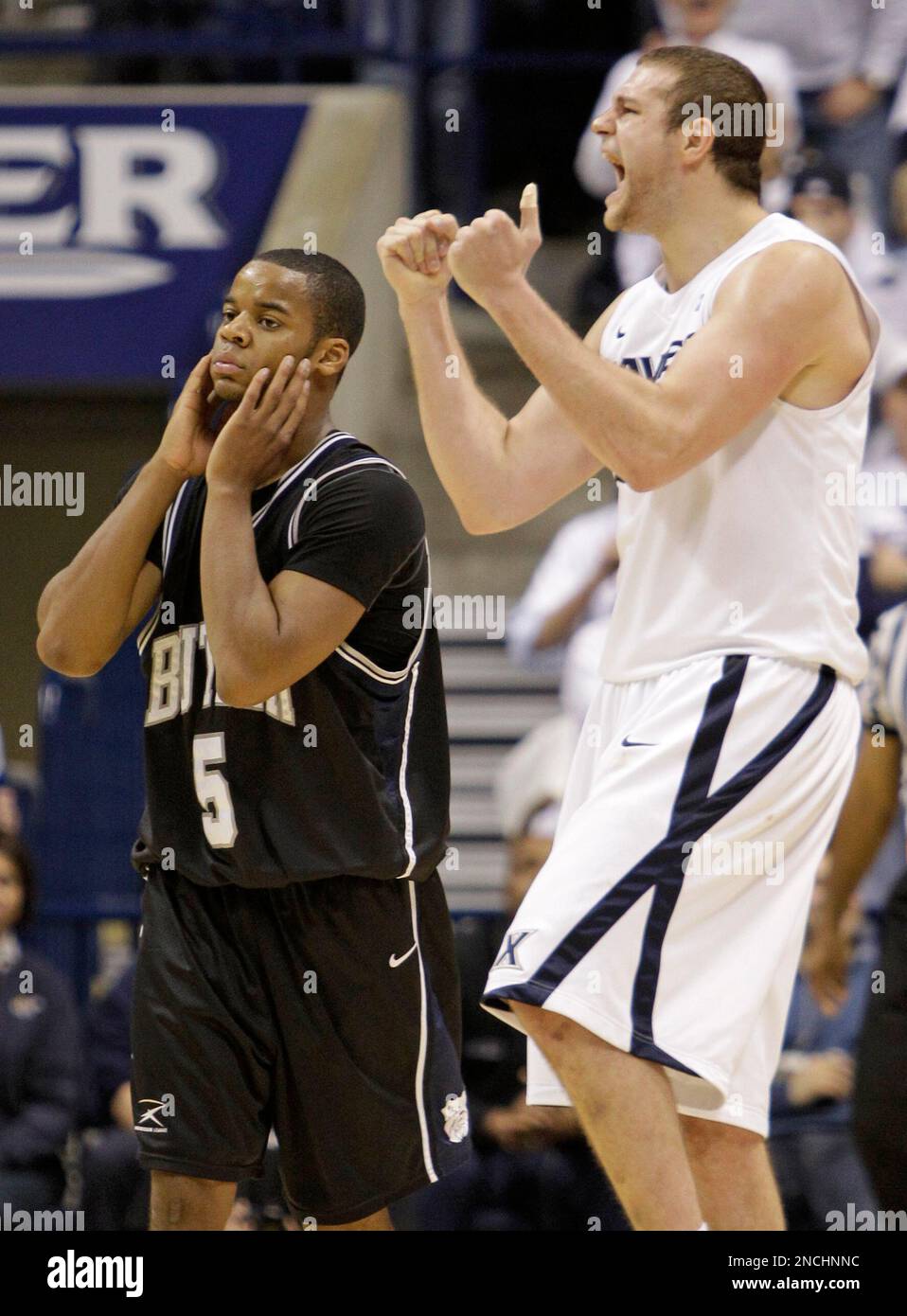 Xavier center Kenny Frease reacts after Butler guard Ronald Nored (5 ...