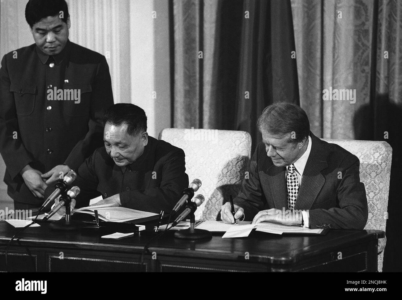 Chinese Vice Premier Teng Hsiao-ping, left, and President Jimmy Carter ...