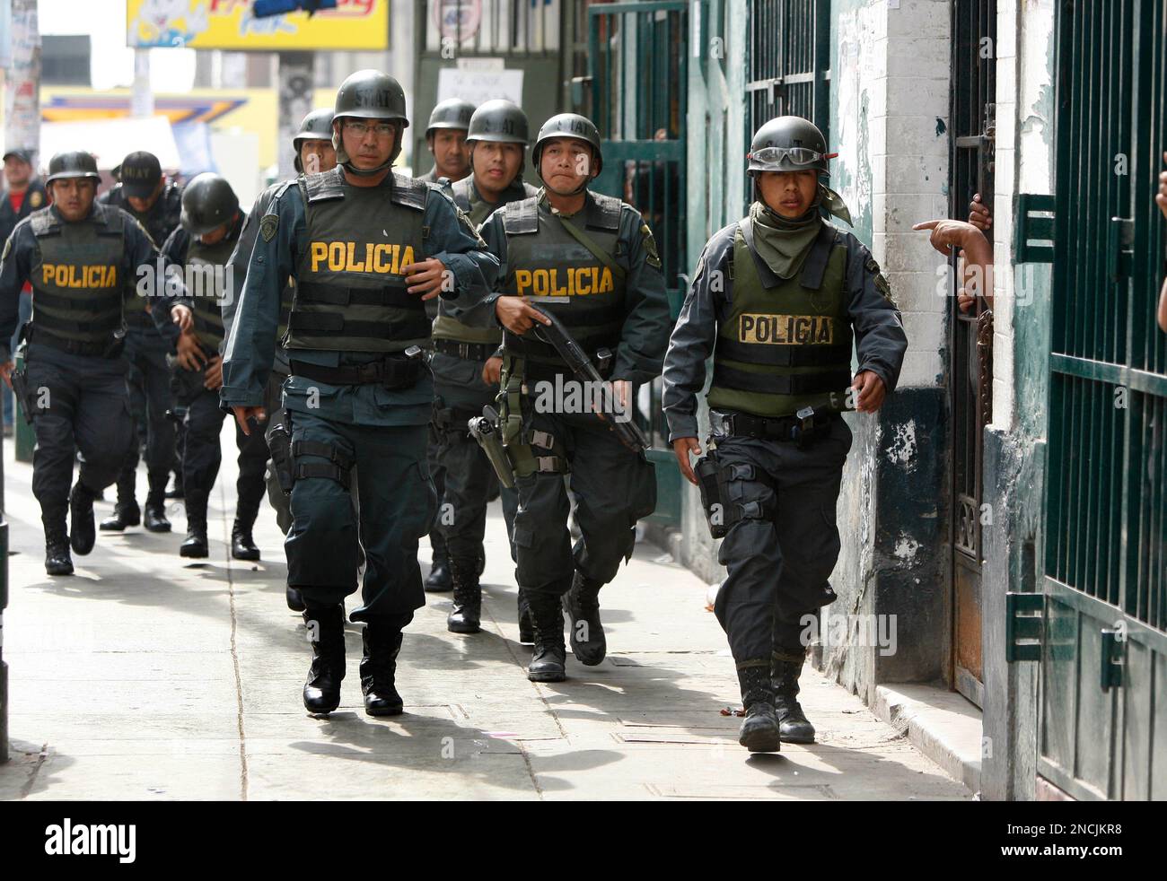 Members of Peru's police special weapons and tactics operations unit ...