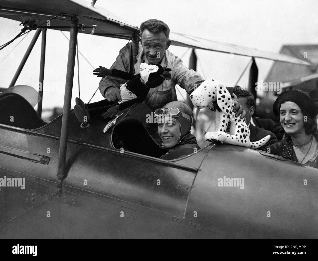 Pilot Amy Johnson shown in the cockpit of a plane as she left Stage ...