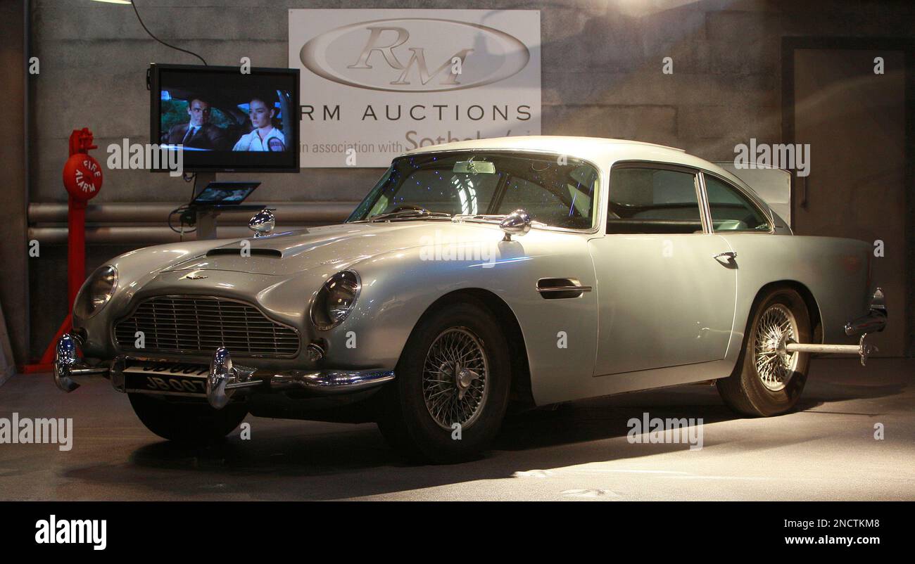 The 'James Bond' 1964 Aston Martin DB5, is viewed by the media, in ...