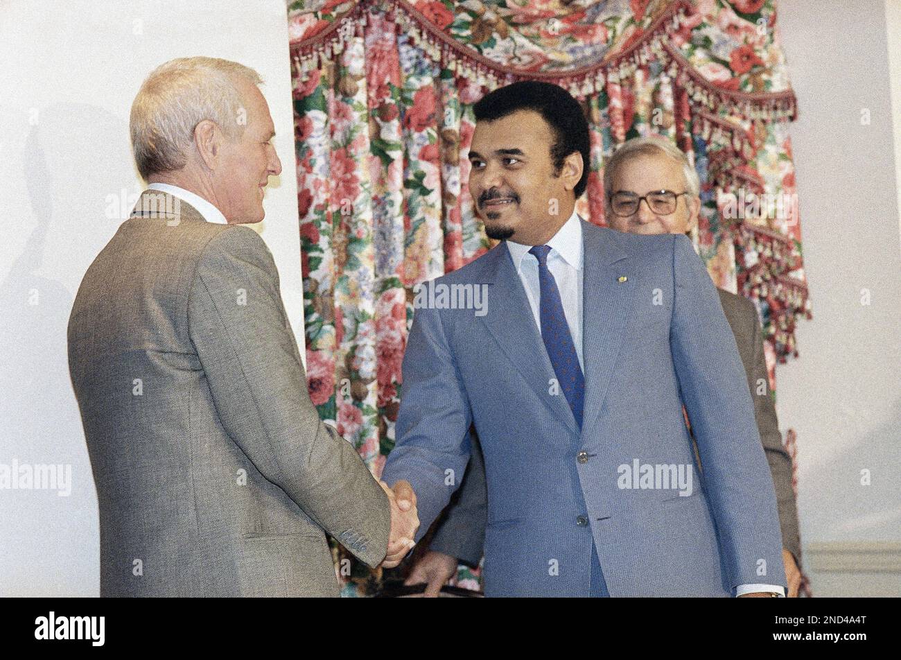 Actor Paul Newman, left, chats with Prince Bandar bin Sultan, the ...