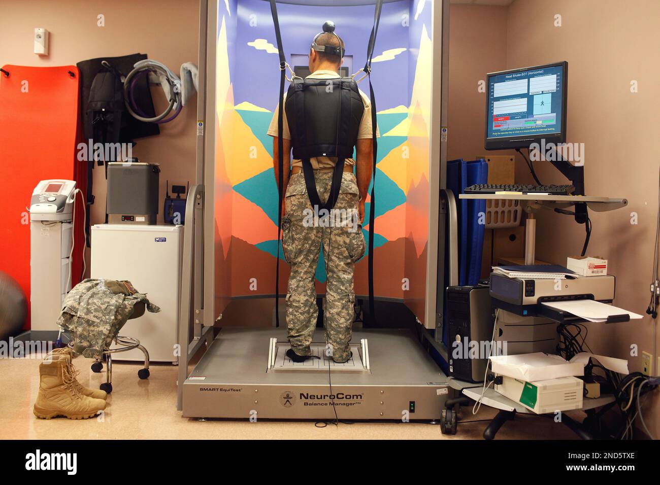 In this June 3, 2010 photo, 1st Lt. Timothy Dwyer is strapped into a ...