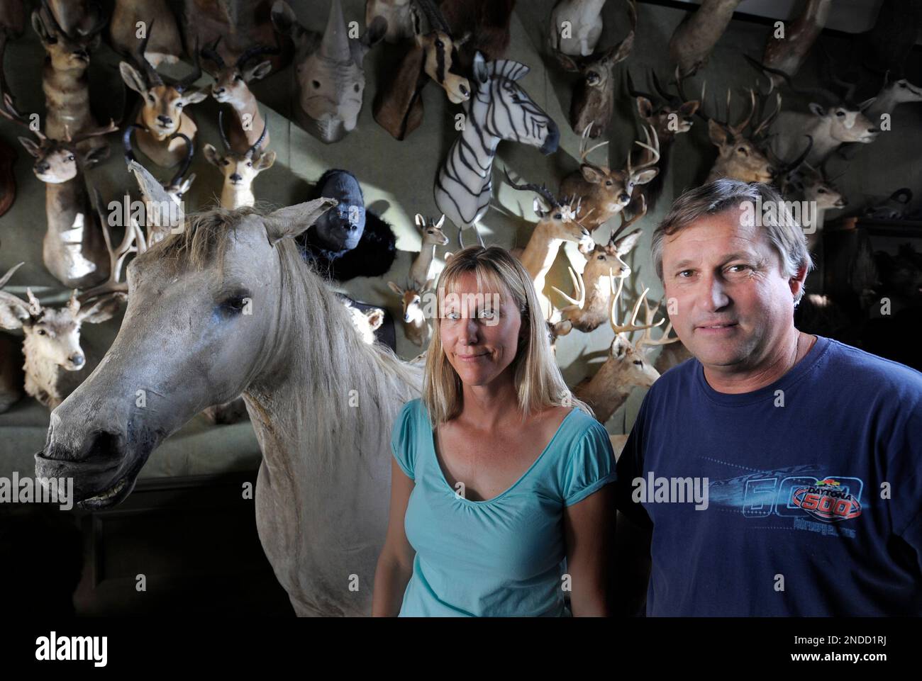 This Wednesday, July 14, 2010 photo shows taxidermists Gary, right, and ...